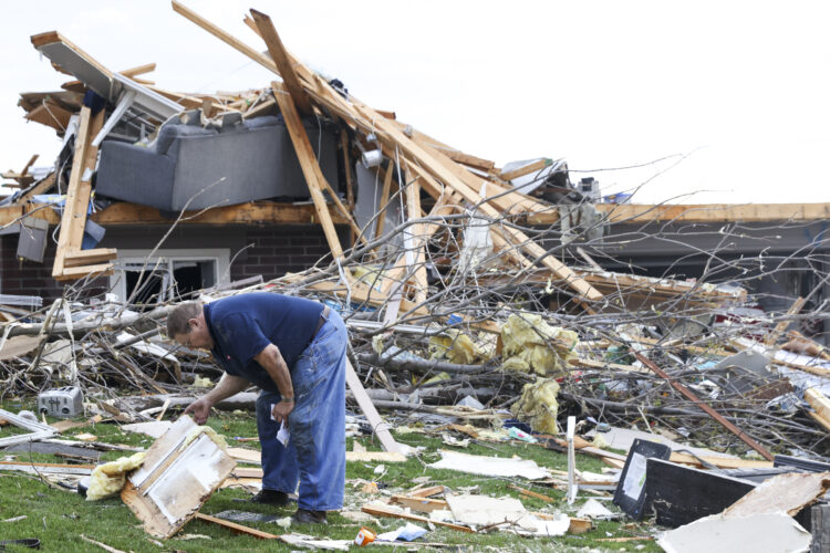 Residents begin going through the rubble after tornadoes hammer parts of Nebraska and Iowa ...